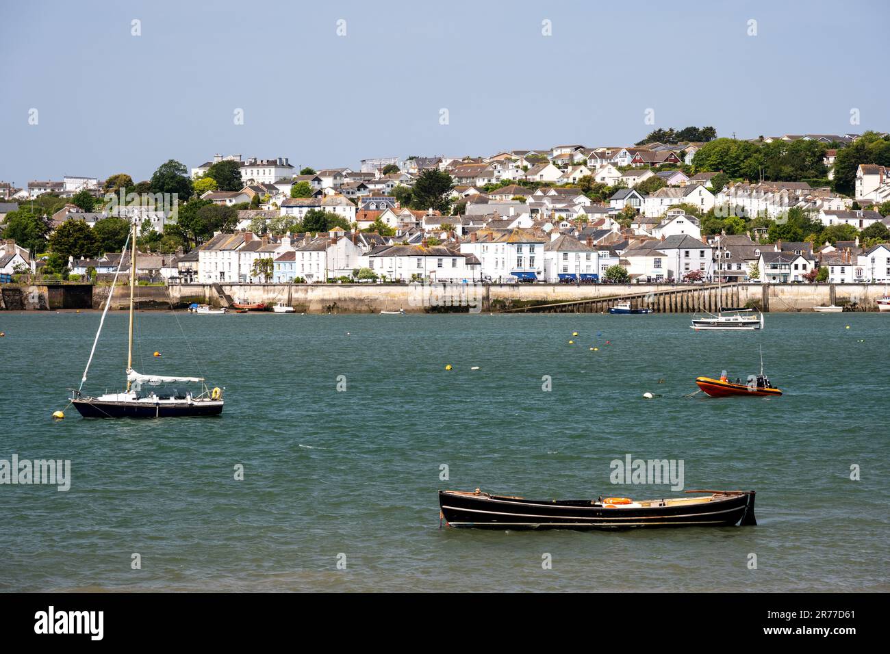 Boats are moored in the Torridge estuary at Instow in North Devon, with ...