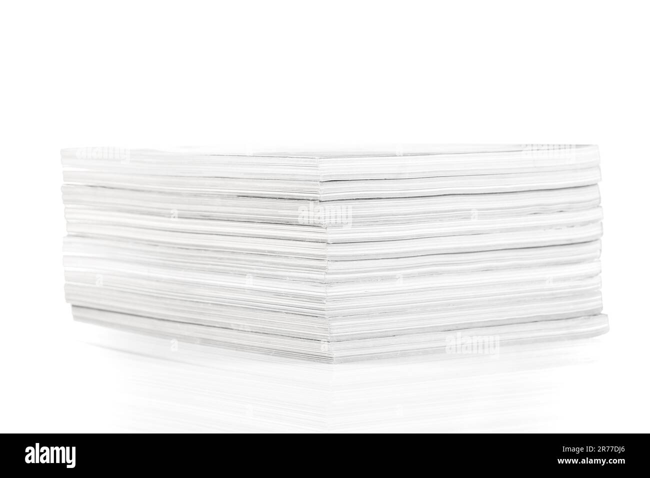 A stack of magazines isolated on a white background Stock Photo - Alamy