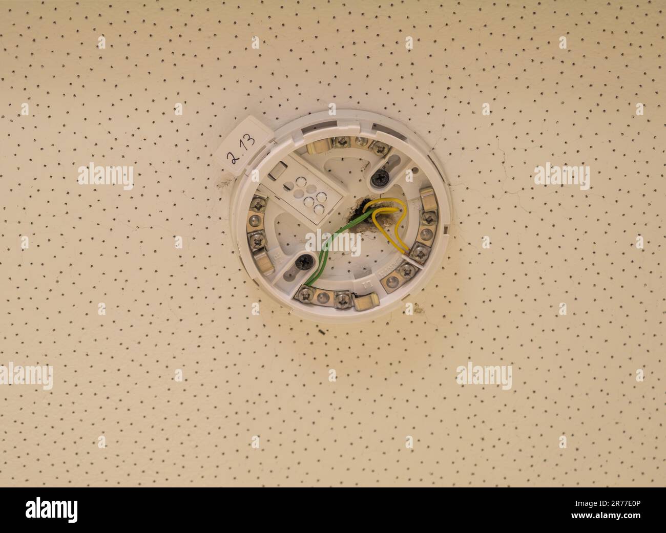 Installation of smoke on the ceiling. smoke detector in disassembled ...