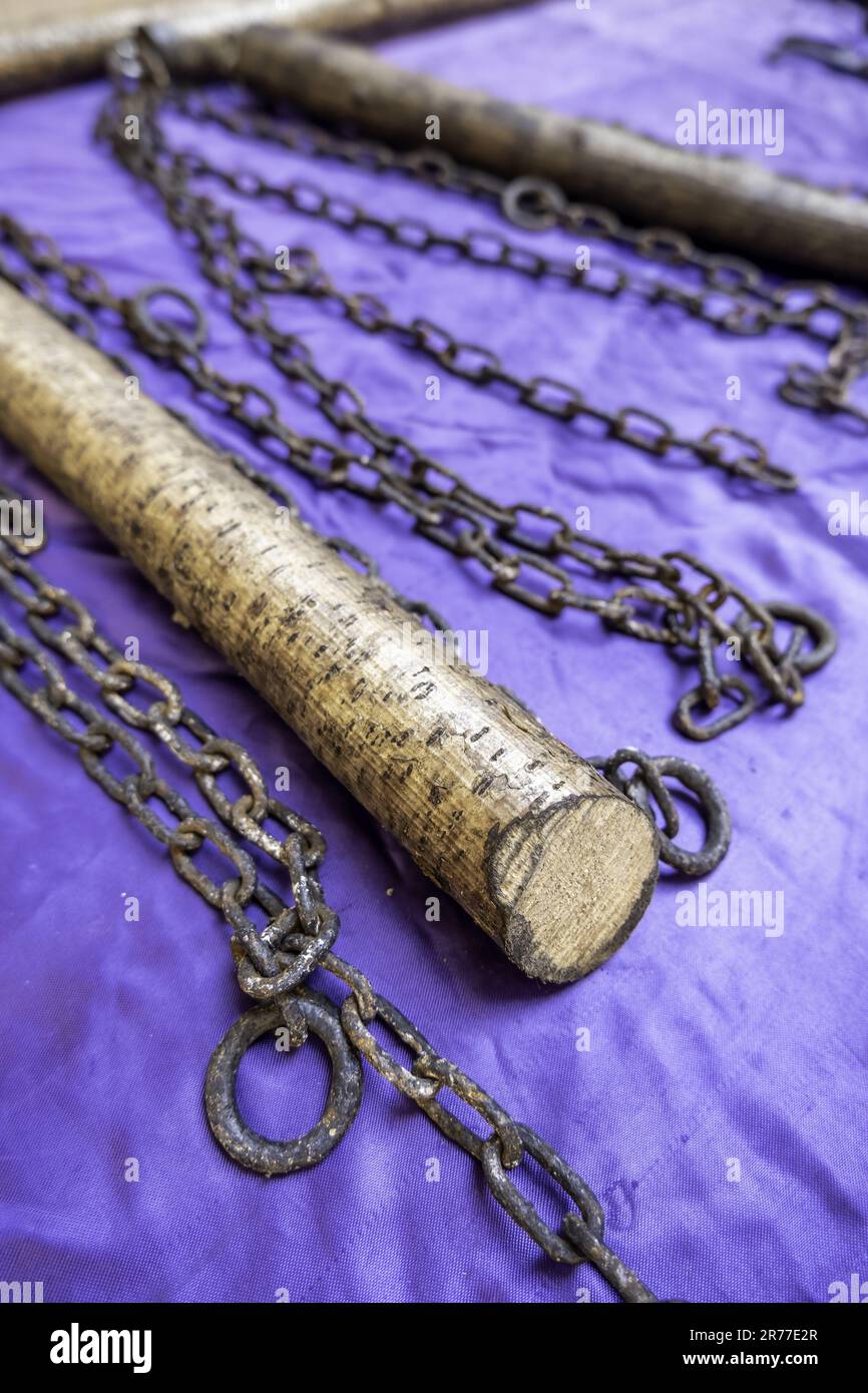 Rusty iron chains, medieval weaponry, inquisition Stock Photo - Alamy