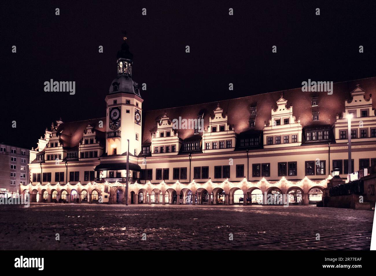 An illuminated night view of Leipzig City Hall, featuring a stunning ...