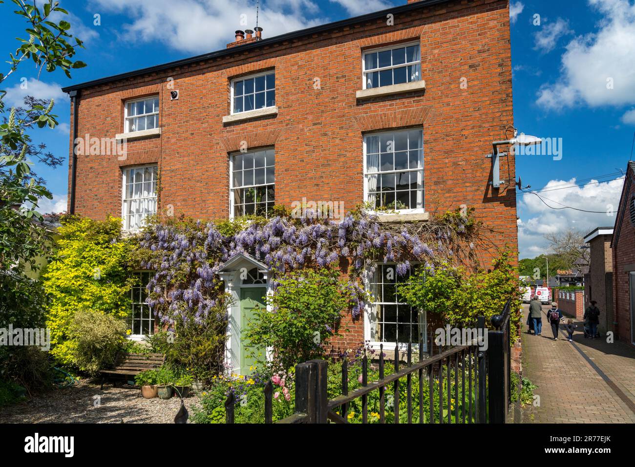 Oswestry, Shropshire - 12 May 2023: Georgian home with wisteria around ...