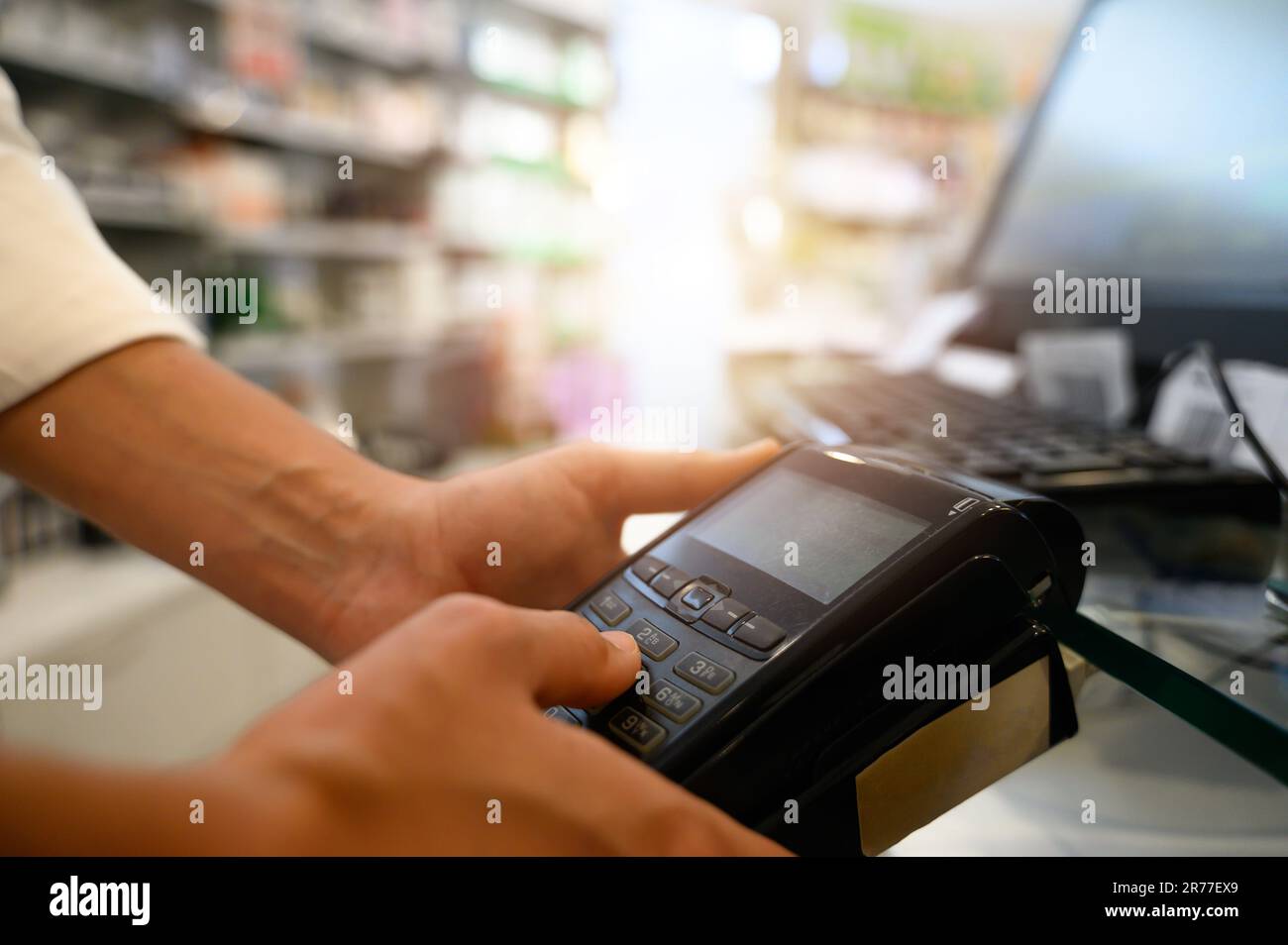 Shop payment by contactless creditcard and POS in a store Stock Photo ...