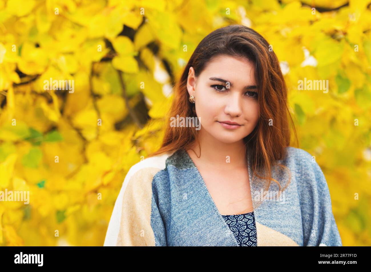Autumn portrait of young and beautiful mixed race Asian Caucasian woman ...