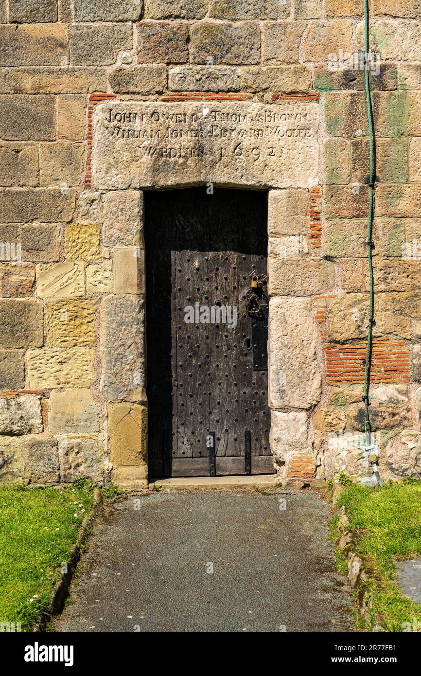Old wooden door in church tower of St Oswalds parish church in market ...