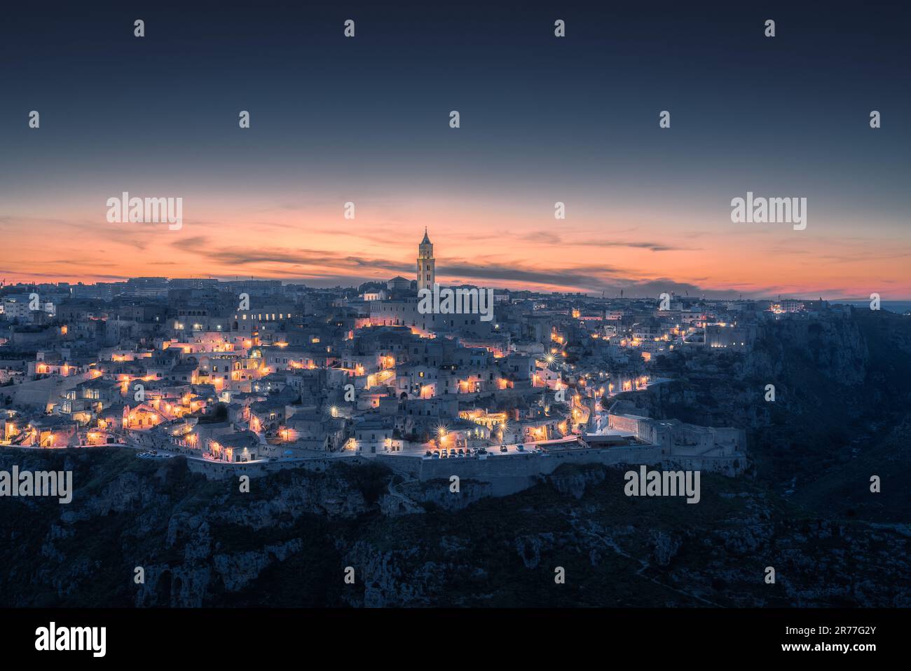 Matera city skyline, the ancient town of Matera at sunrise or sunset ...