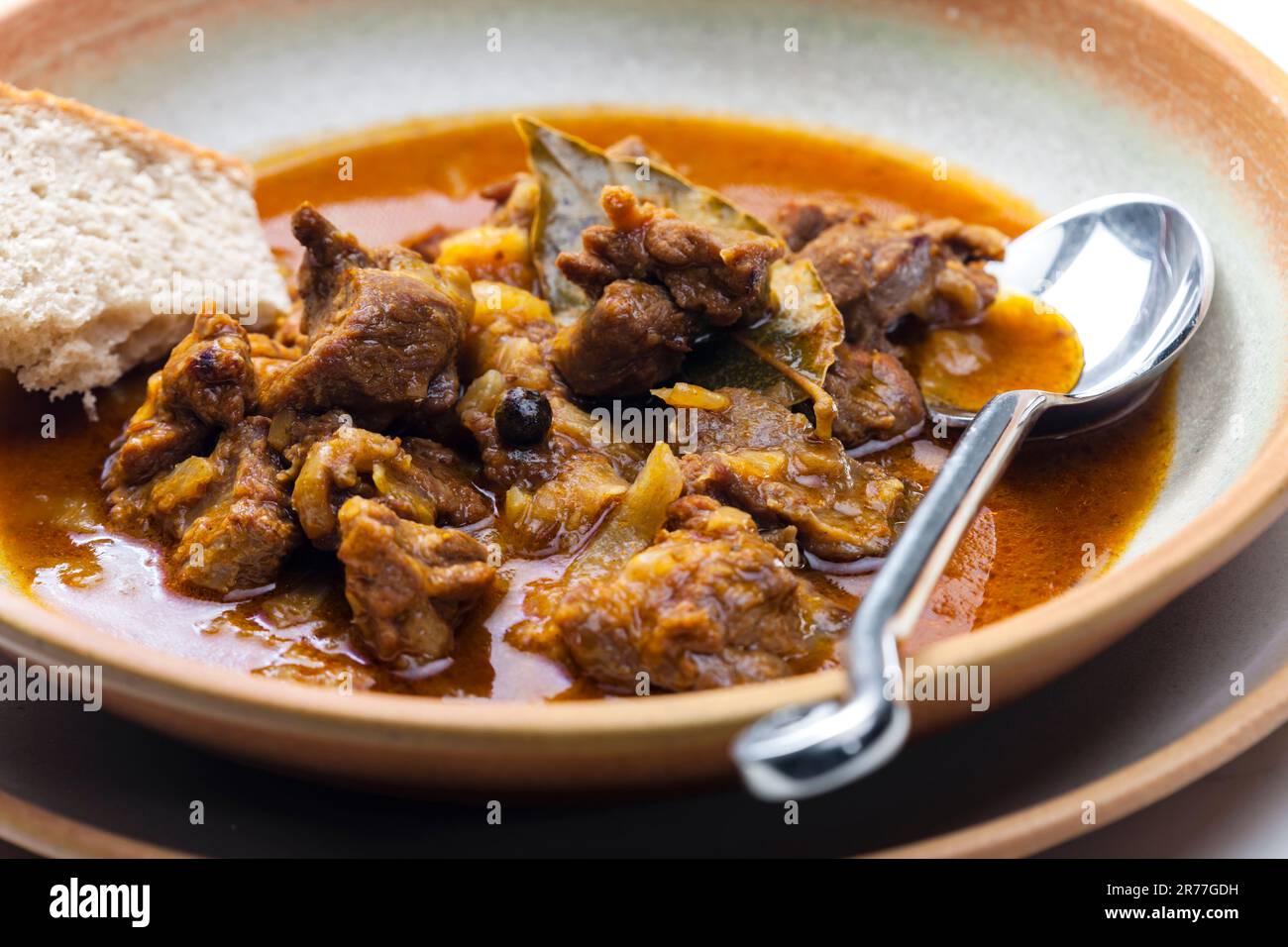 Czech beef goulash served with bread Stock Photo - Alamy