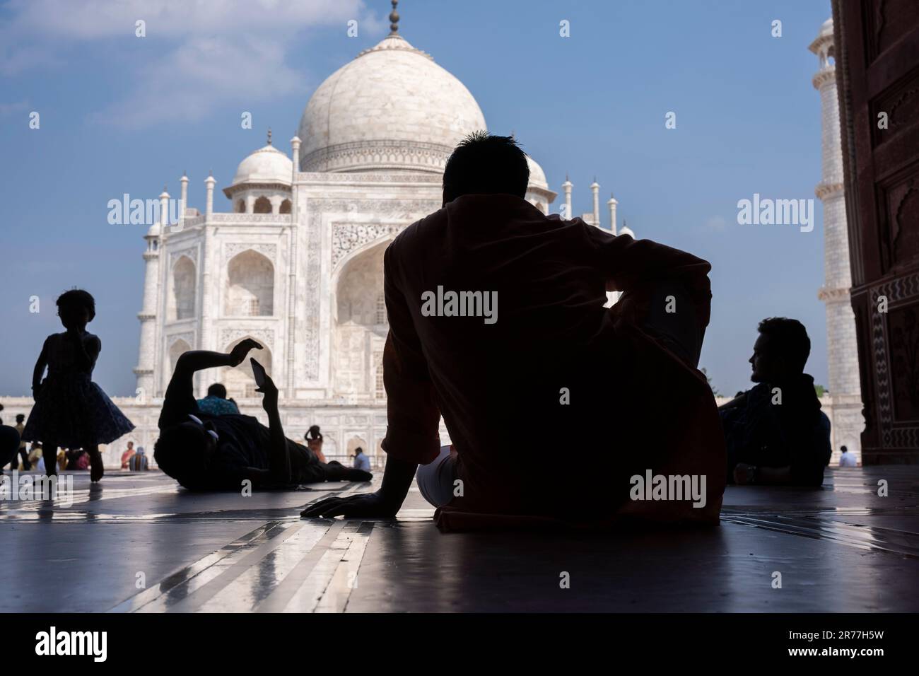 Child plays and men rest in shade, Taj Mahal, UNESCO World Heritage Site, Agra, Uttar Pradesh ...