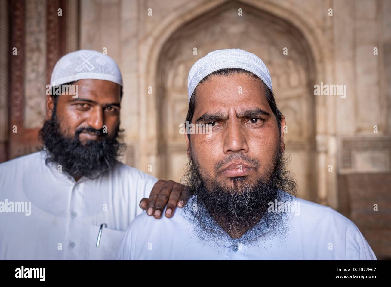 Muslim men and friends visit mosque, Taj Mahal, UNESCO World Heritage ...