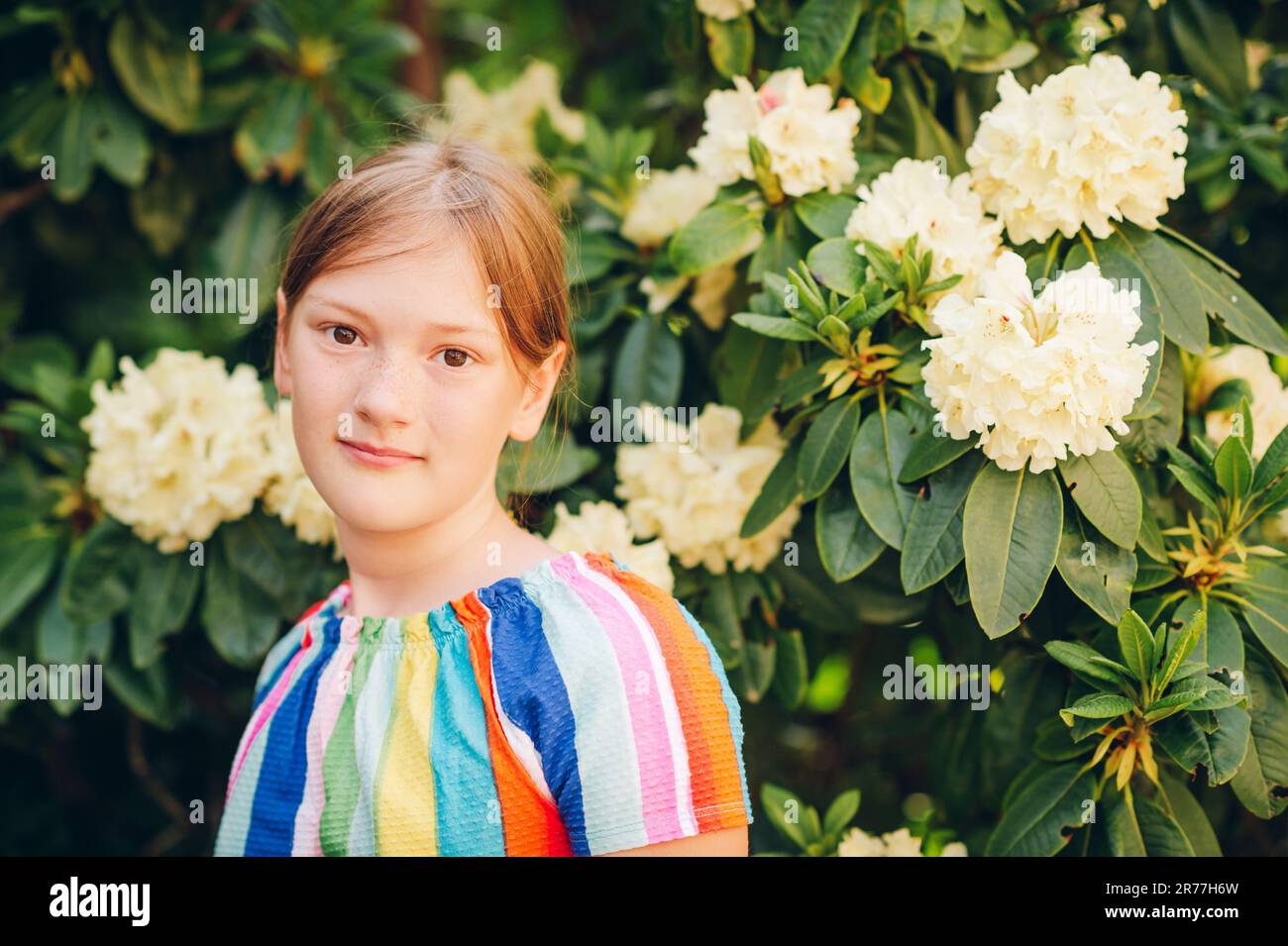 Outdoor spring portrait of sweet little 10 year old girl posing in the ...