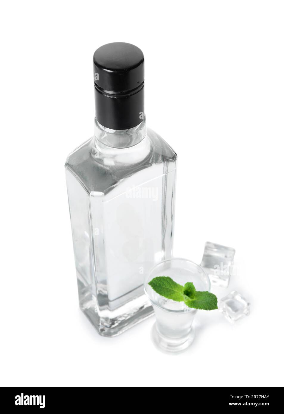 Bottle and glass of vodka isolated on white background Stock Photo - Alamy