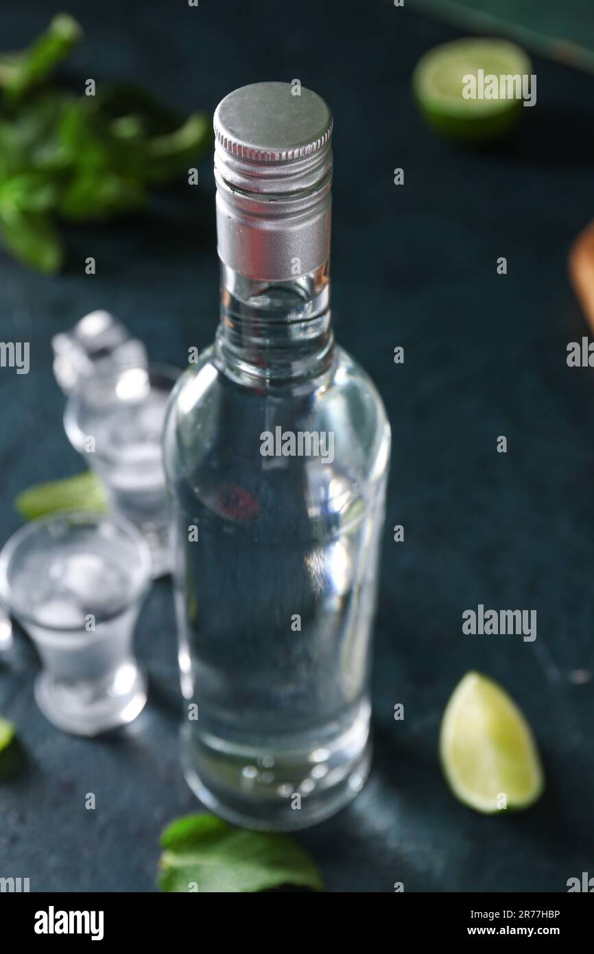 Bottle of vodka on black background Stock Photo - Alamy