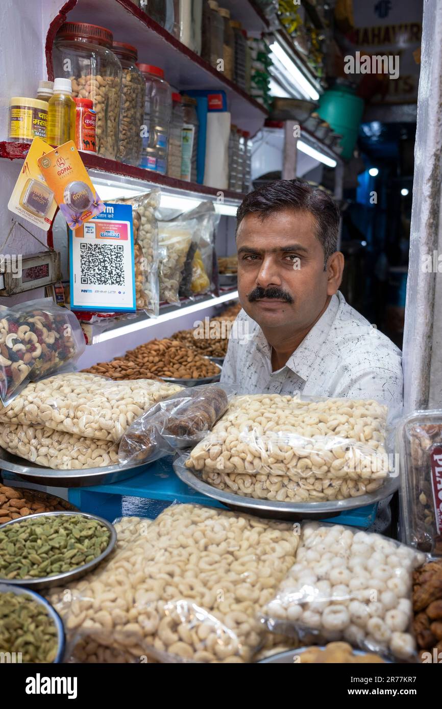 Shop keeper displays food, Old Delhi section, New Delhi, India, Asia ...