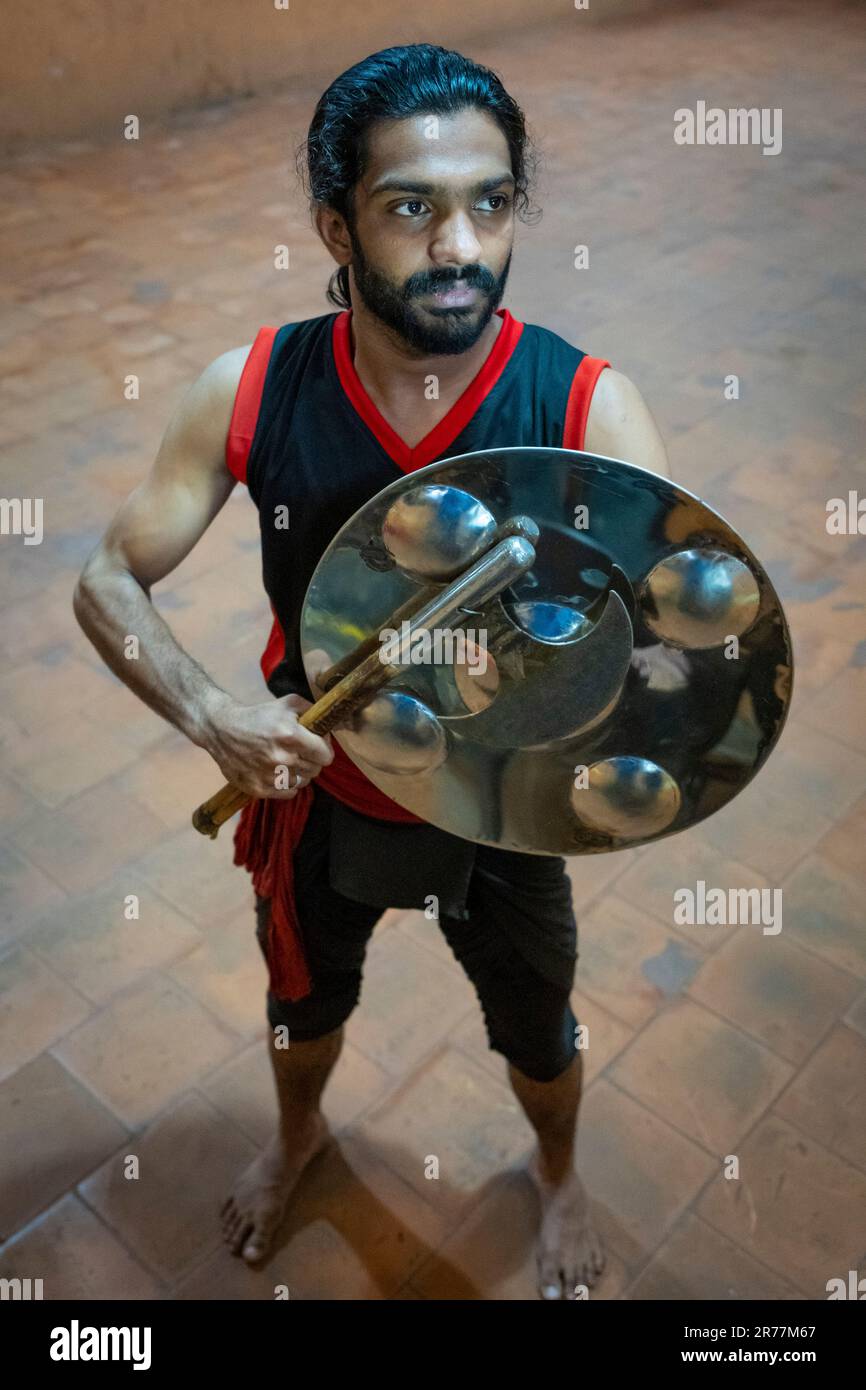Performer demonstrates traditional Indian martial arts at the ...
