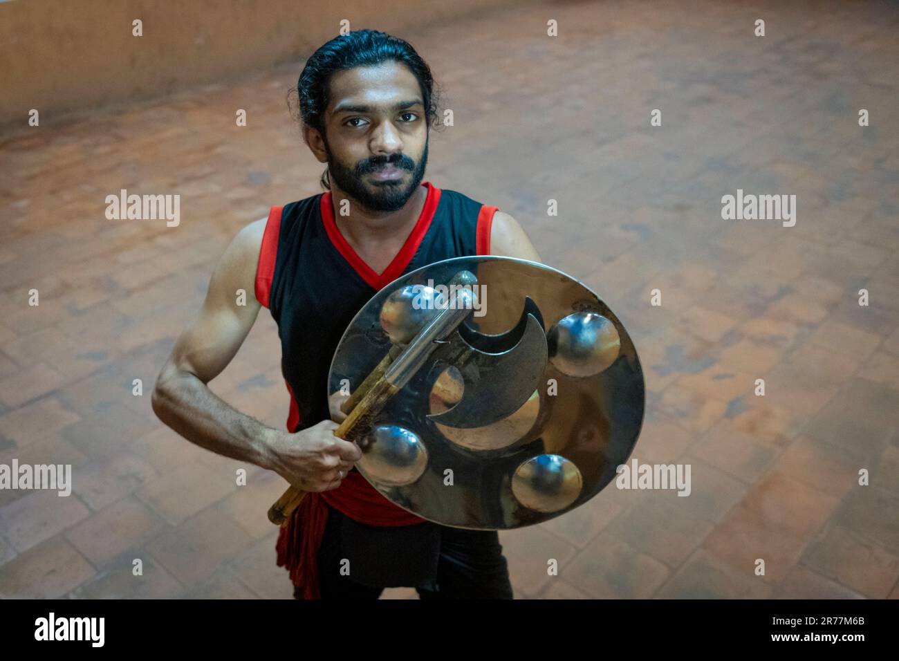 Performer demonstrates traditional Indian martial arts at the ...
