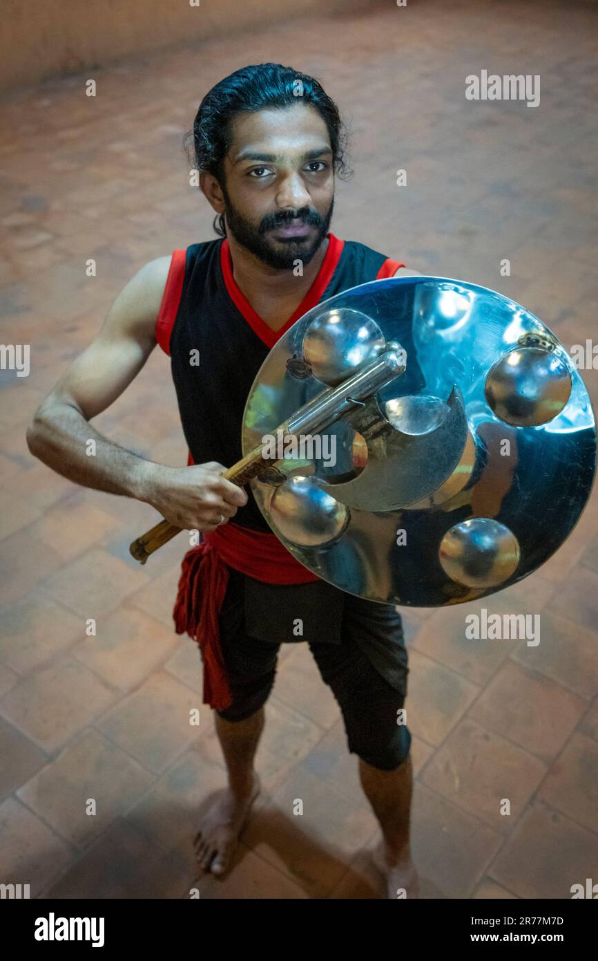 Performer demonstrates traditional Indian martial arts at the ...