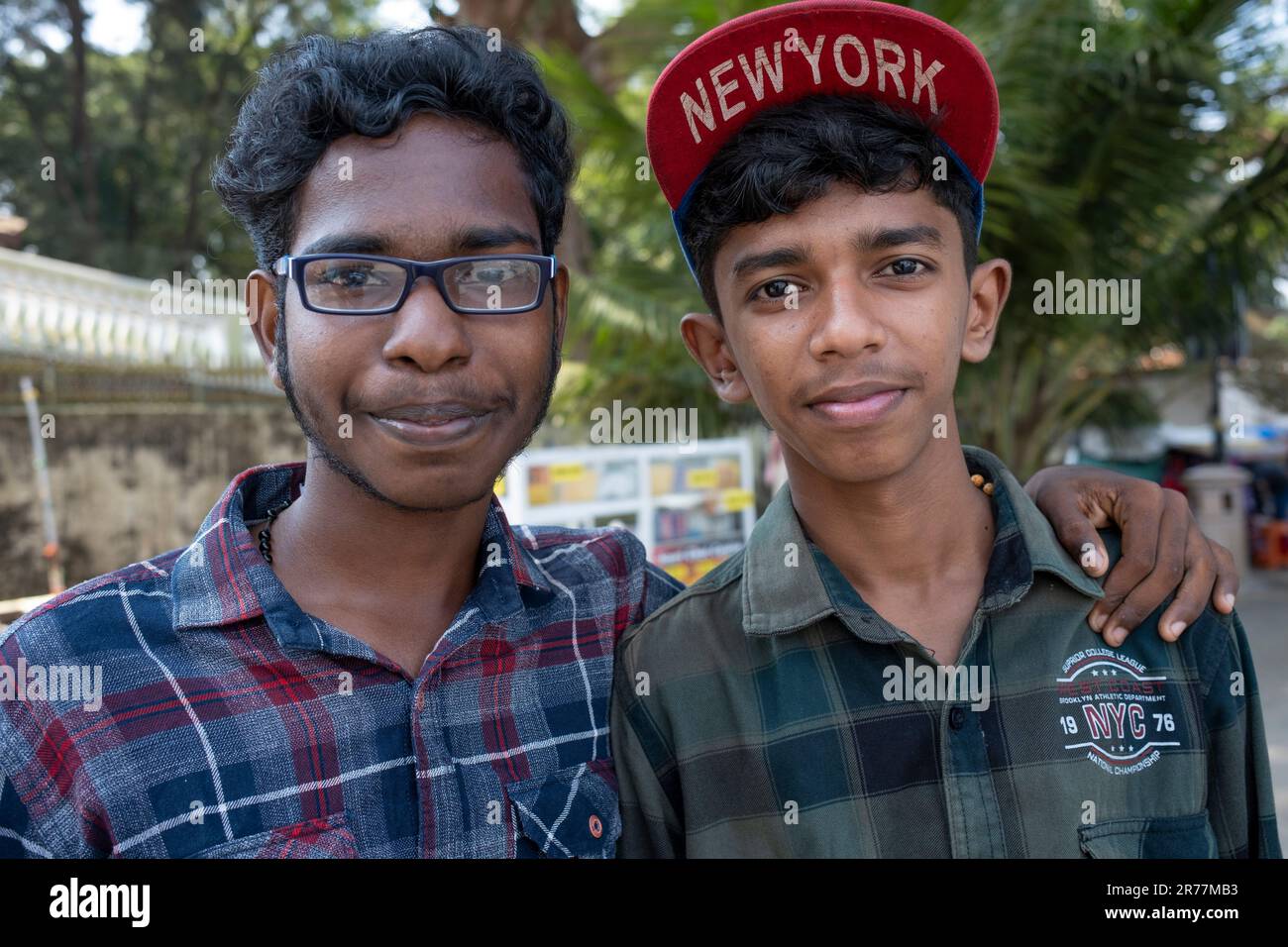 Two friends enjoy each other's company while visiting colonial Fort ...