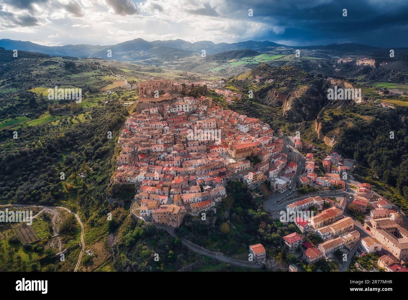 Aerial view of Italian hilltop town, Rocca Imperiale at dusk in the ...