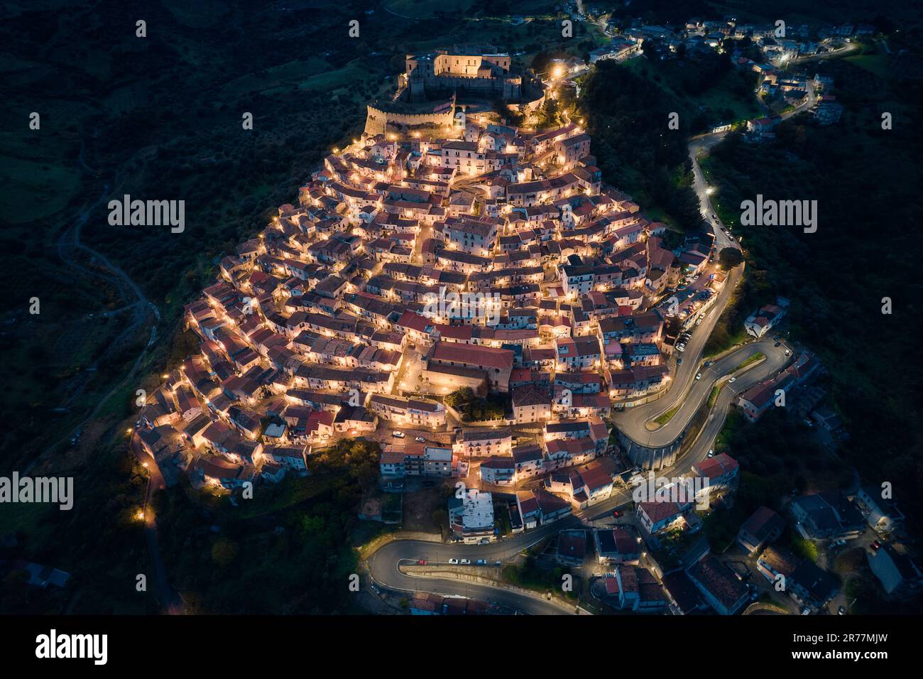 Aerial view of Italian hilltop town, Rocca Imperiale at dusk in the ...