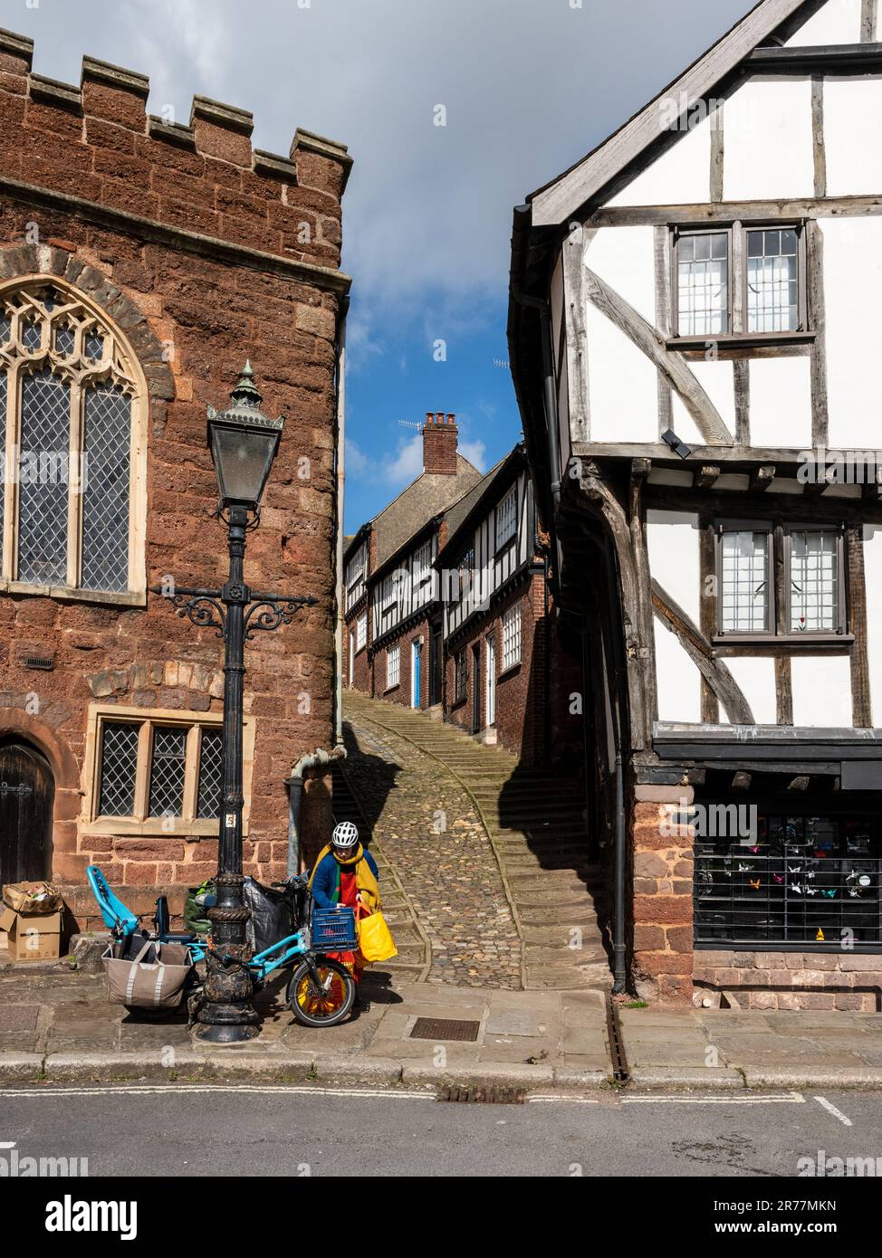 Quaint old timber frame buildings climb Stepcote Hill beside St Mary ...