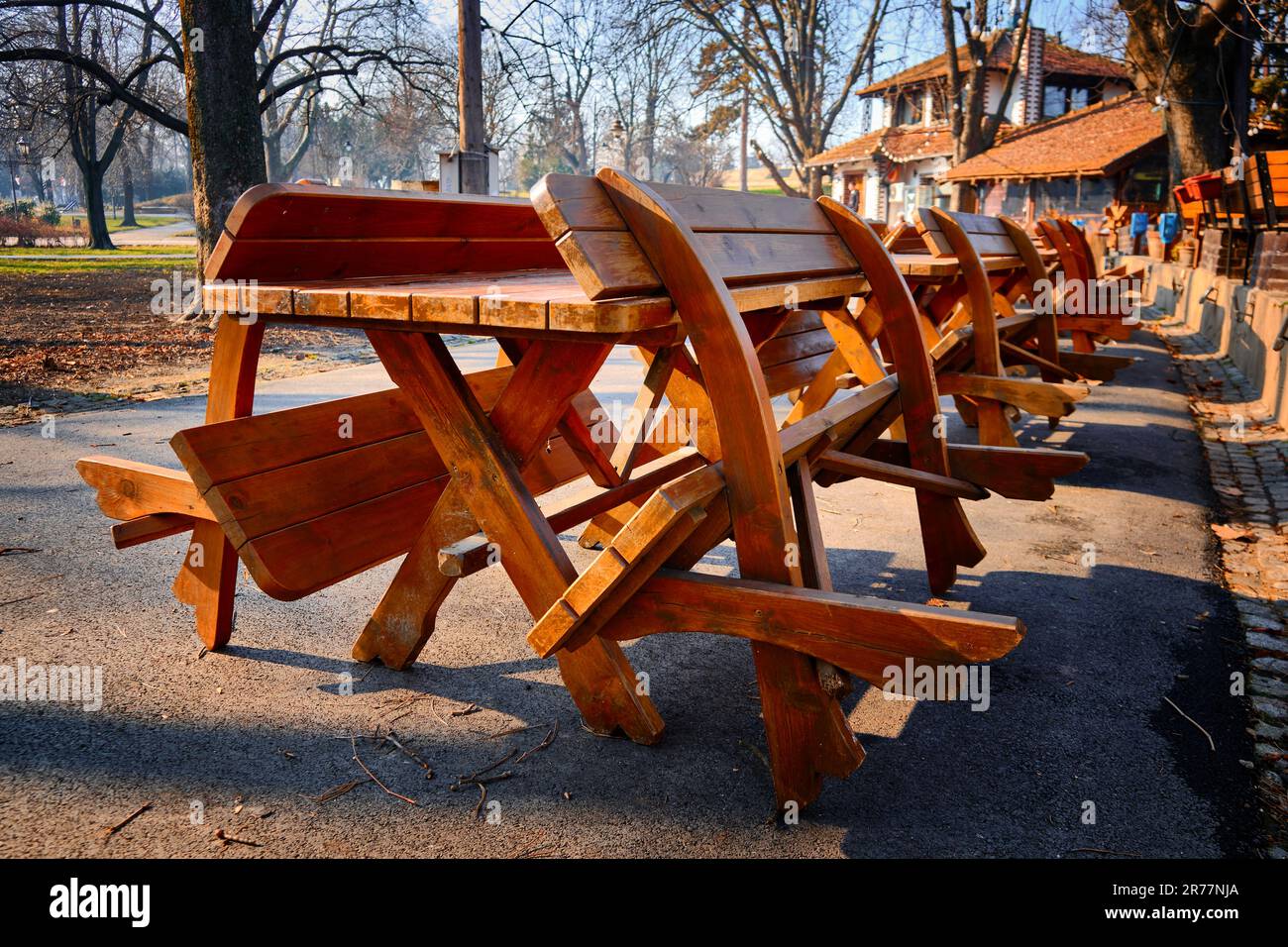 Wooden table and benches at park Stock Photo - Alamy