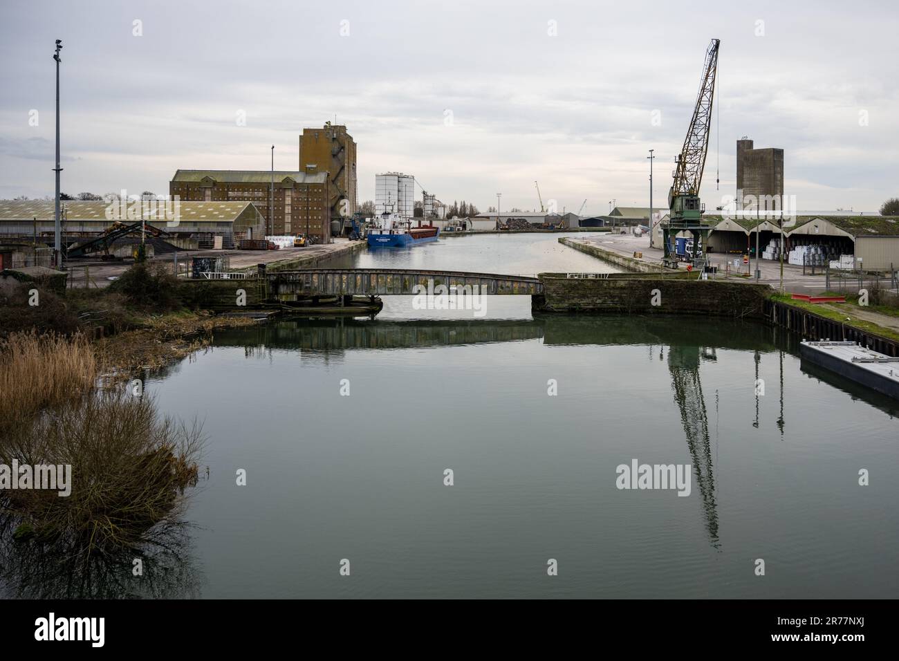 Warehouses and grain silos line the quaysides of Sharpness Dock in ...
