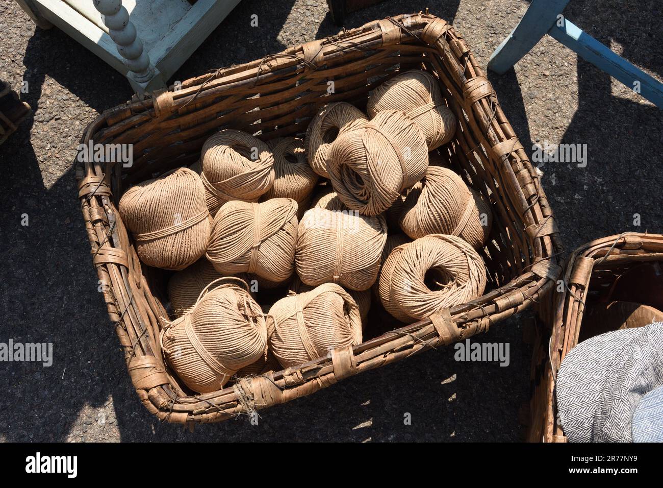 Traditional basket with reels of garden twine Stock Photo - Alamy