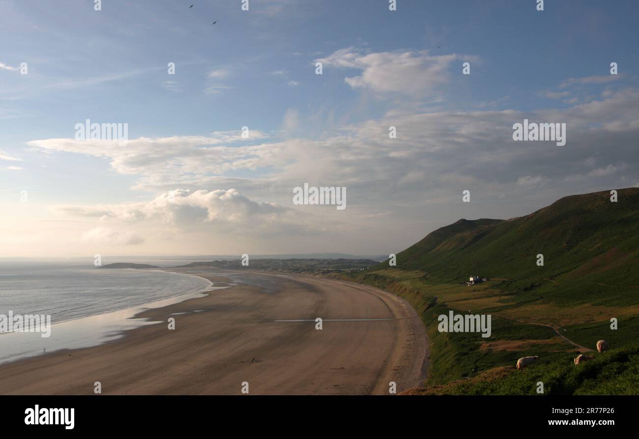 Views over Rhossili Bay Gower Peninsula Wales at sunset Stock Photo - Alamy