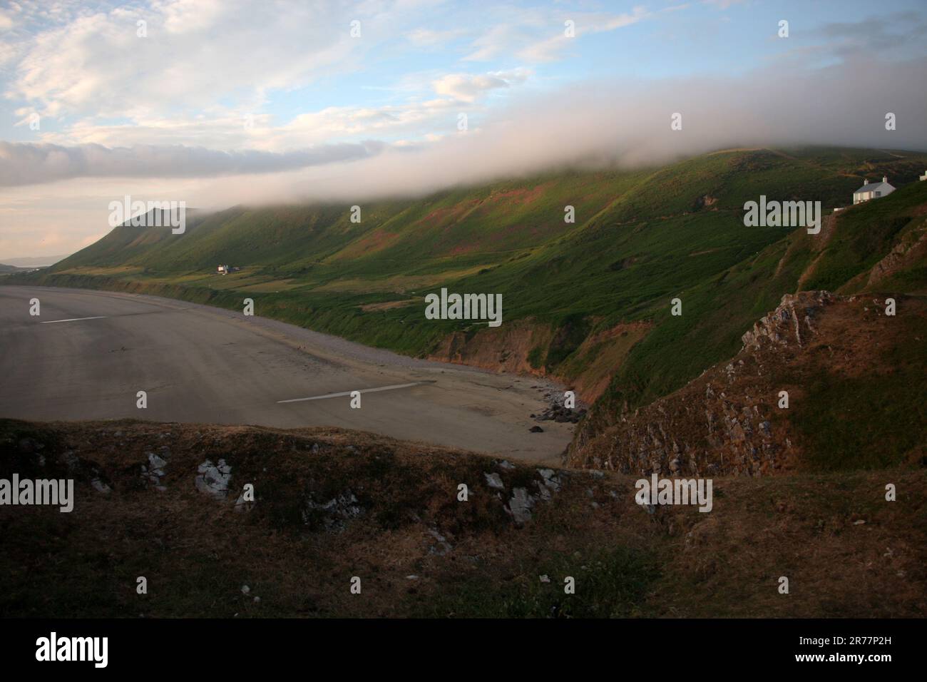 Views over Rhossili Bay Gower Peninsula Wales at sunset Stock Photo - Alamy