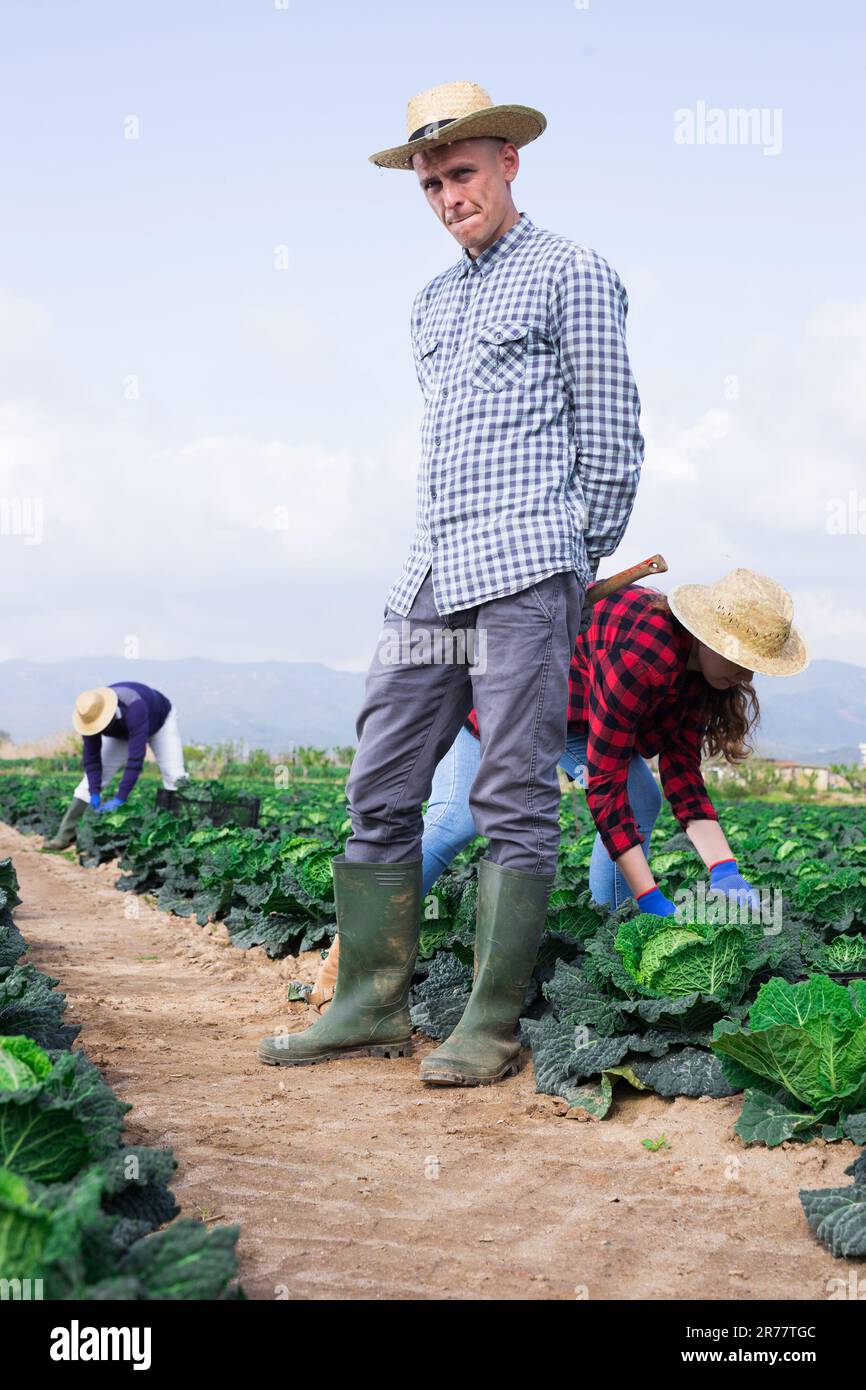 Portrait of man farmer with ax in hand Stock Photo - Alamy