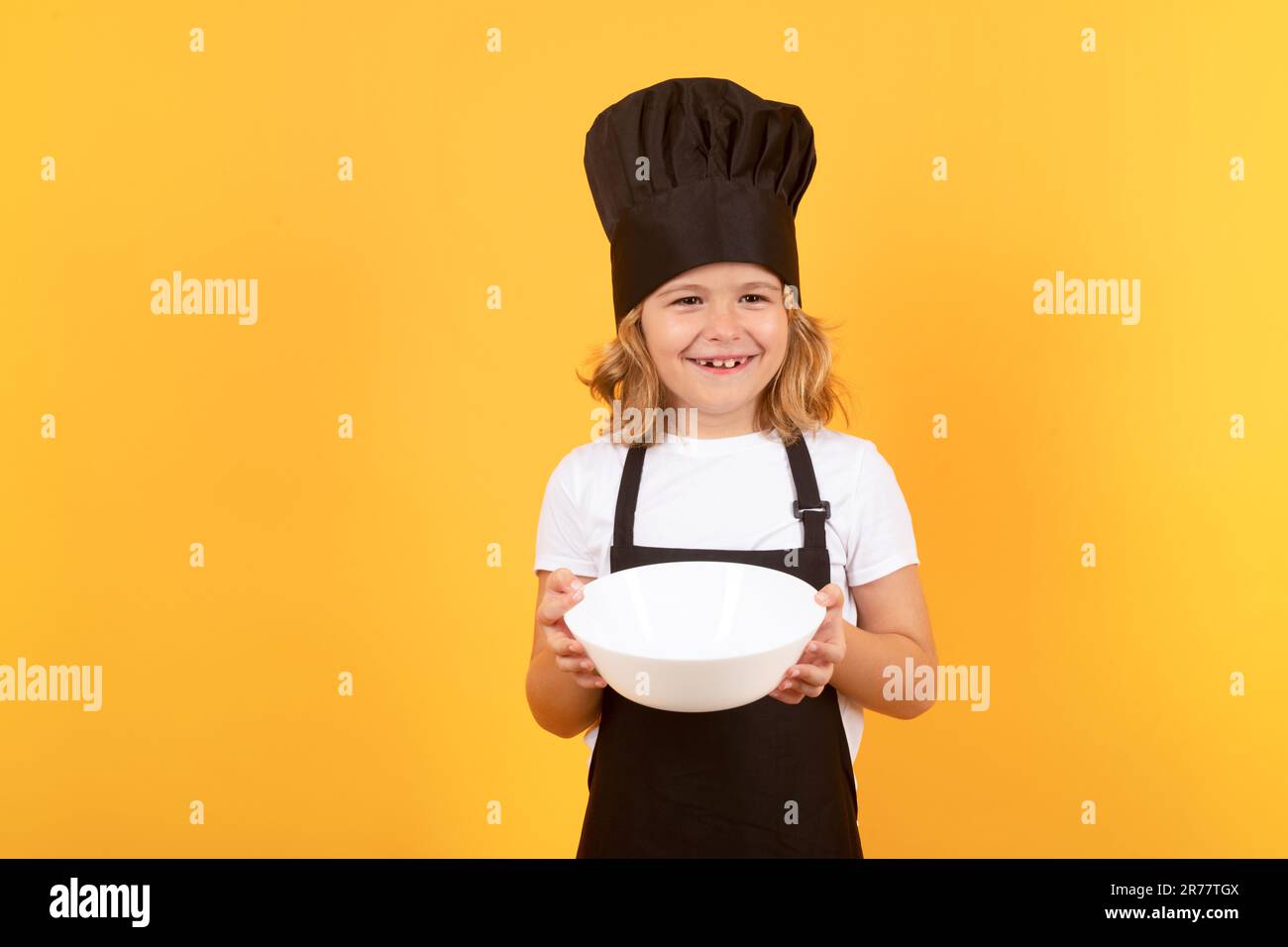 Funny child cook with cooking plate. Cooking children. Chef kid boy ...