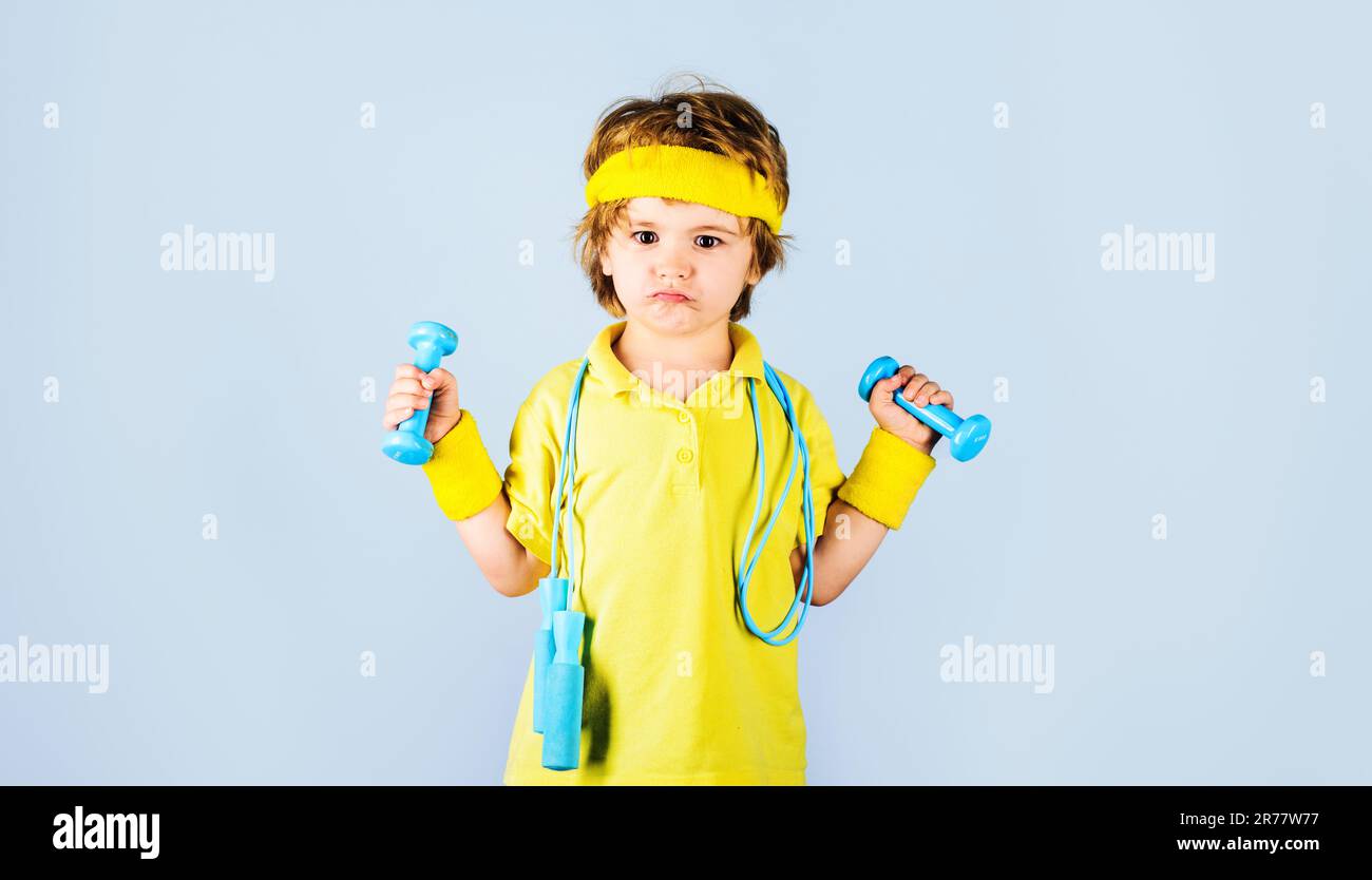 Childhood activity. Healthy lifestyle. Sporty boy with jumping rope and ...