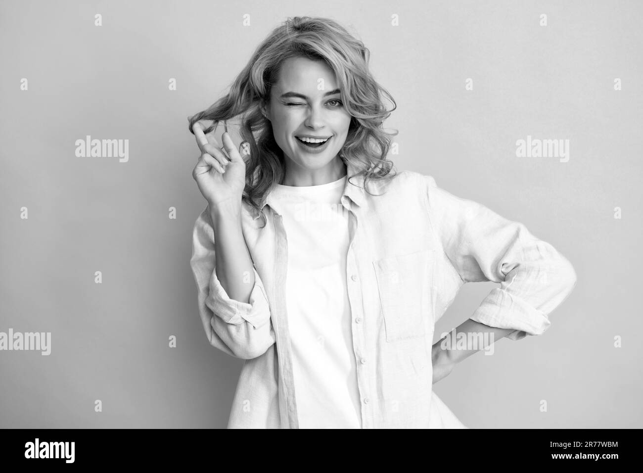 Hispanic beautiful woman winking face Black and White Stock Photos ...