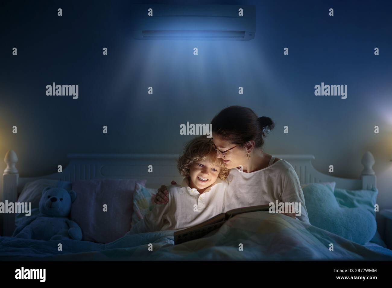 Air conditioner in bedroom. Kids room climate control. Mother and child ...