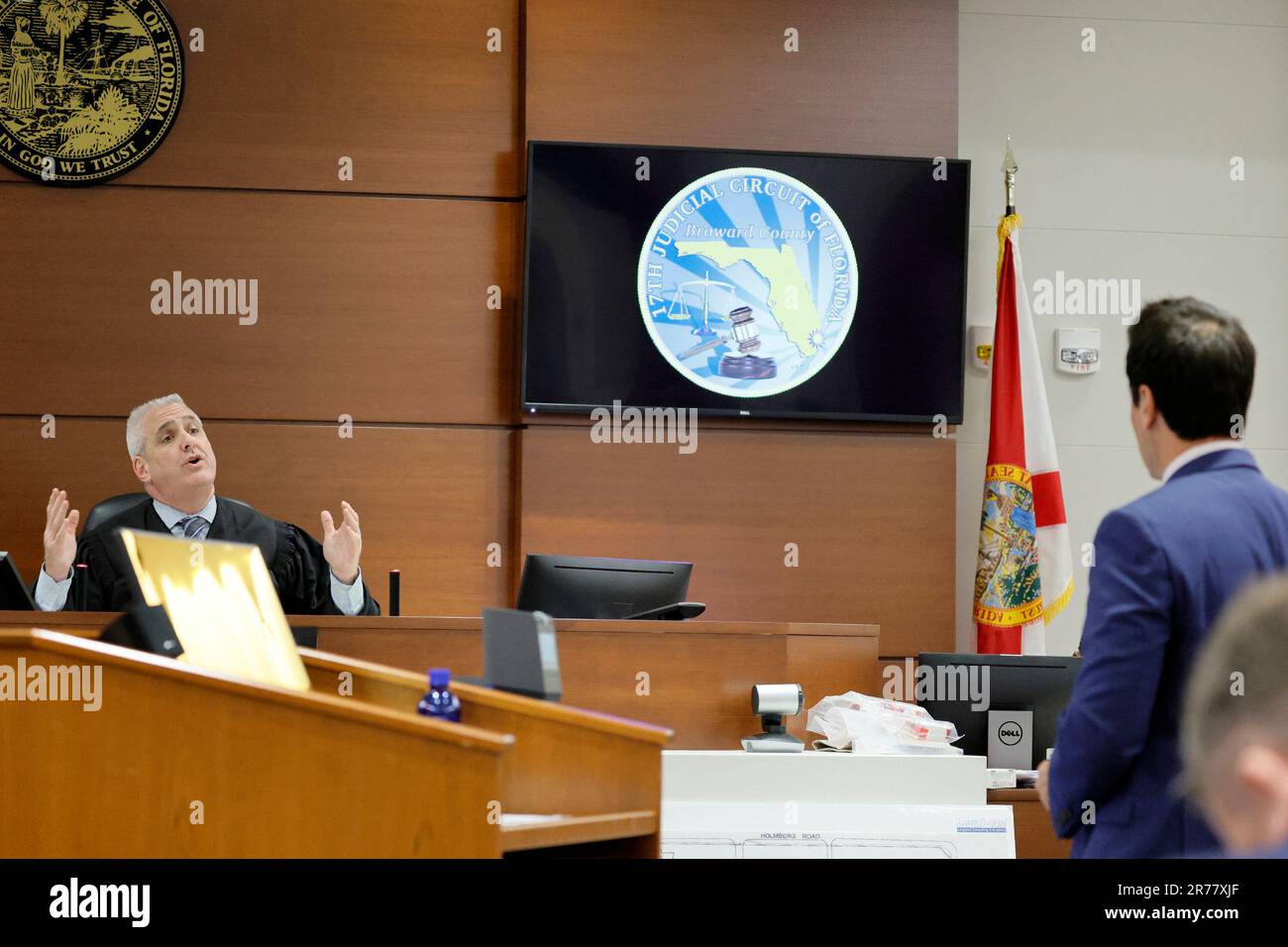 Judge Martin Fein speaks to defense attorney Mark Eiglarsh about his ...