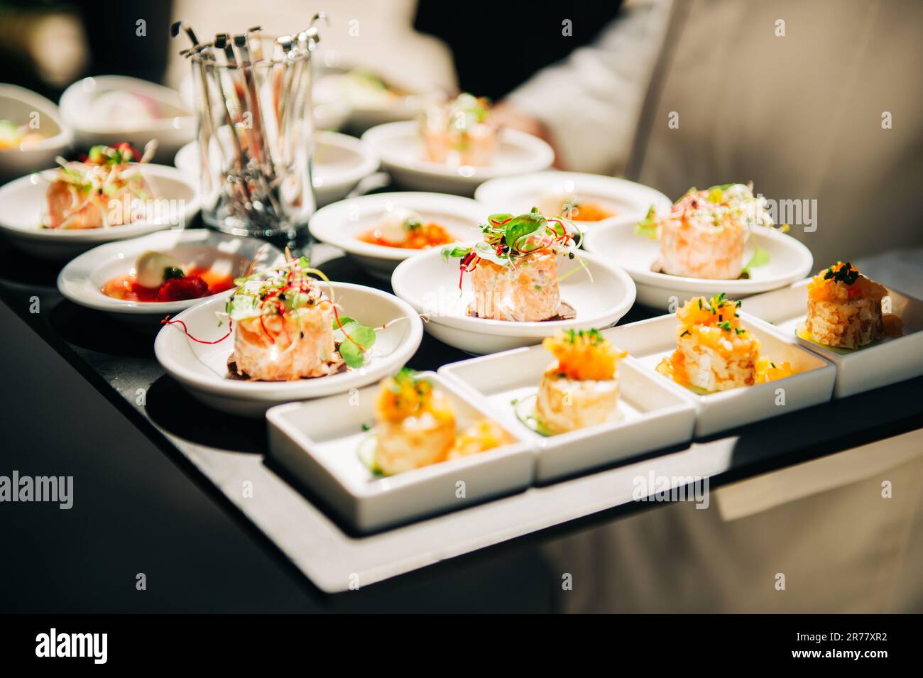 Salmon tatrare in small plates, catering event, banquet food Stock ...
