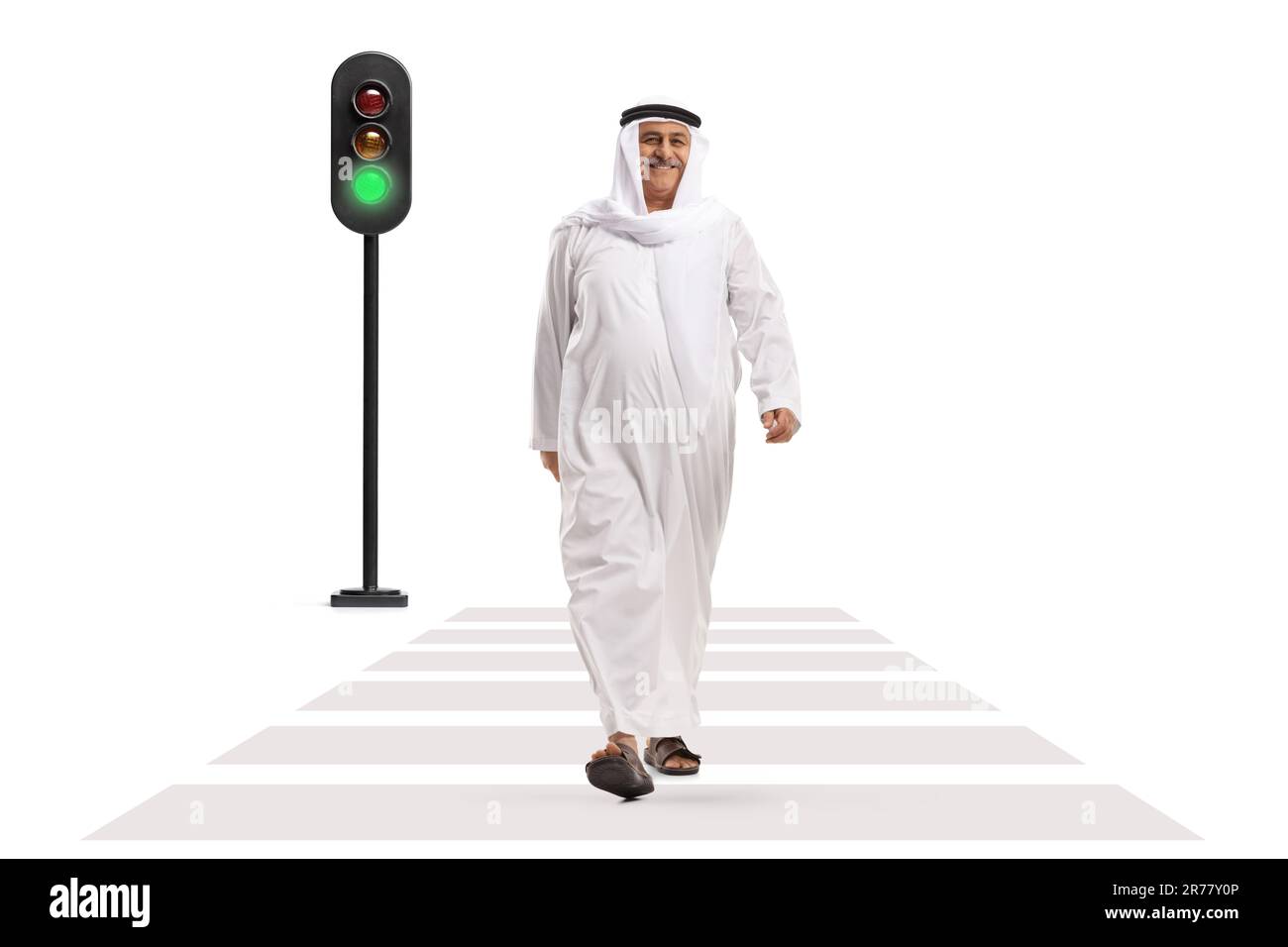 Full length portrait of a cheerful mature arab man walking on a street ...