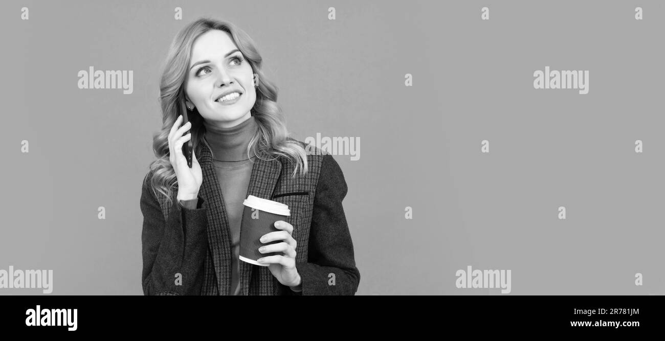 Woman with coffee cup. Chattering girl talk on mobile phone drinking ...