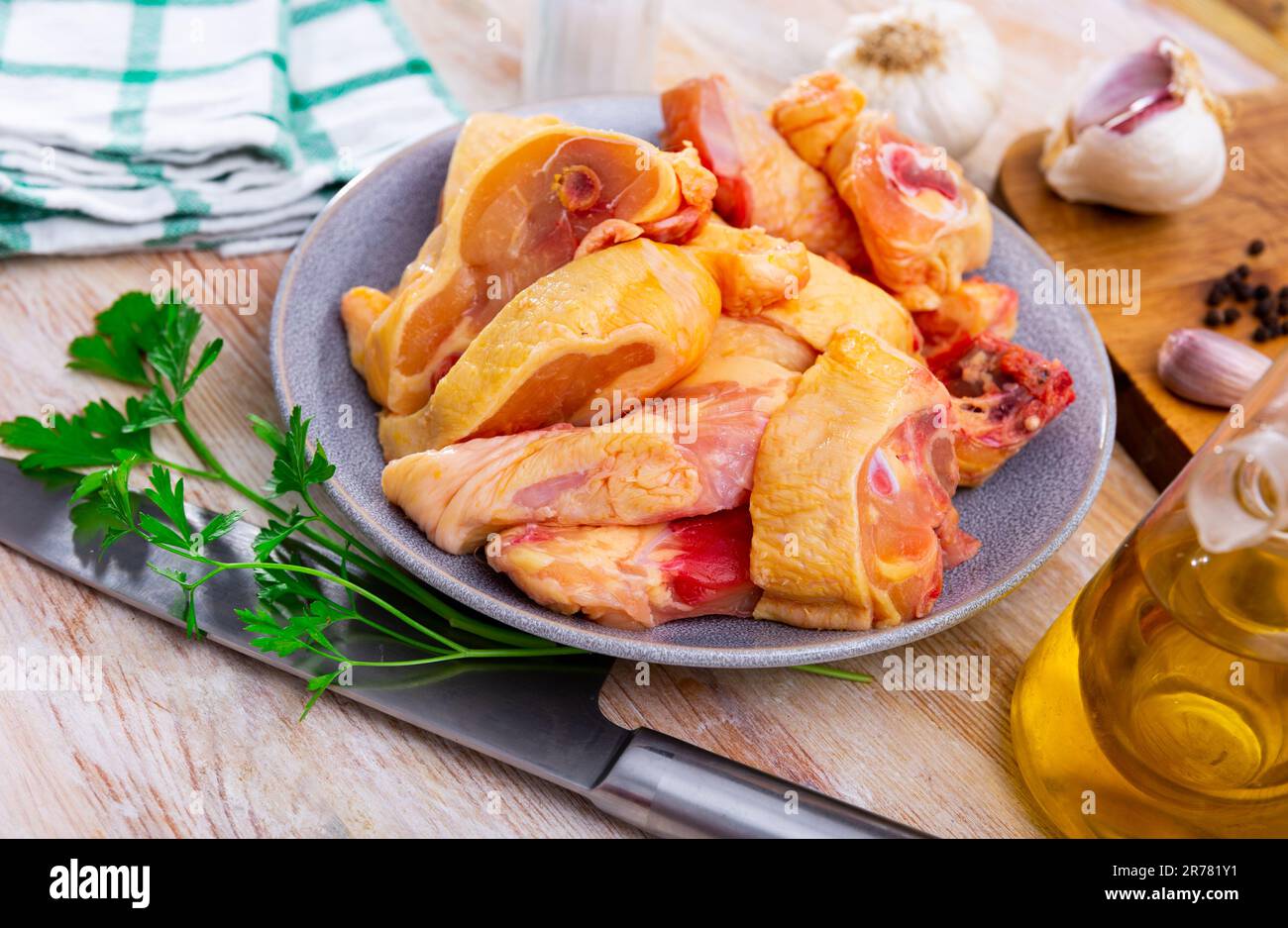 Fresh raw chopped chicken pieces Stock Photo - Alamy