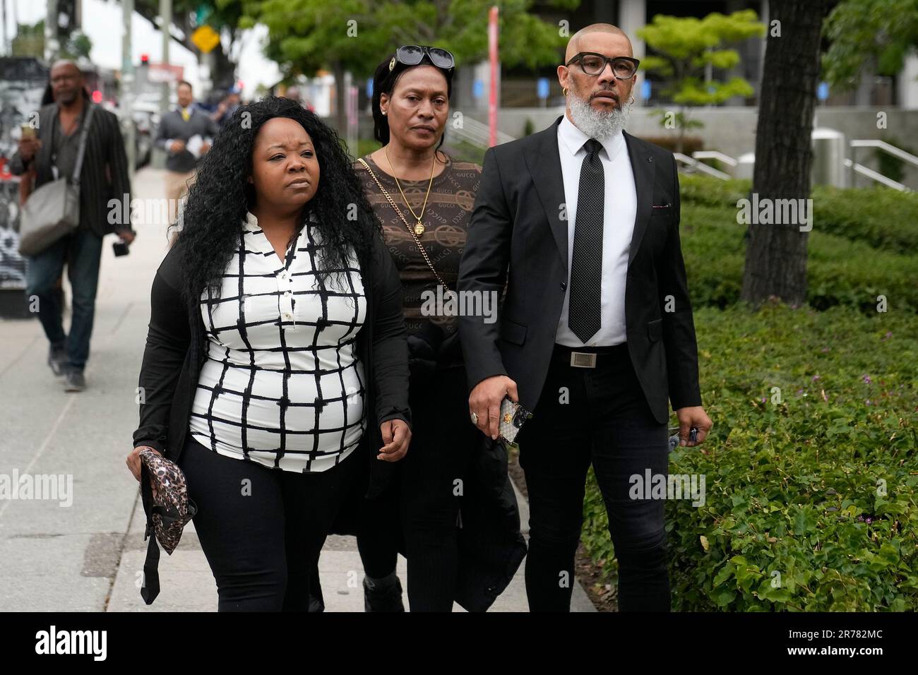 Sonstar Peterson, the father of rapper Tory Lanez, far right, leaves ...