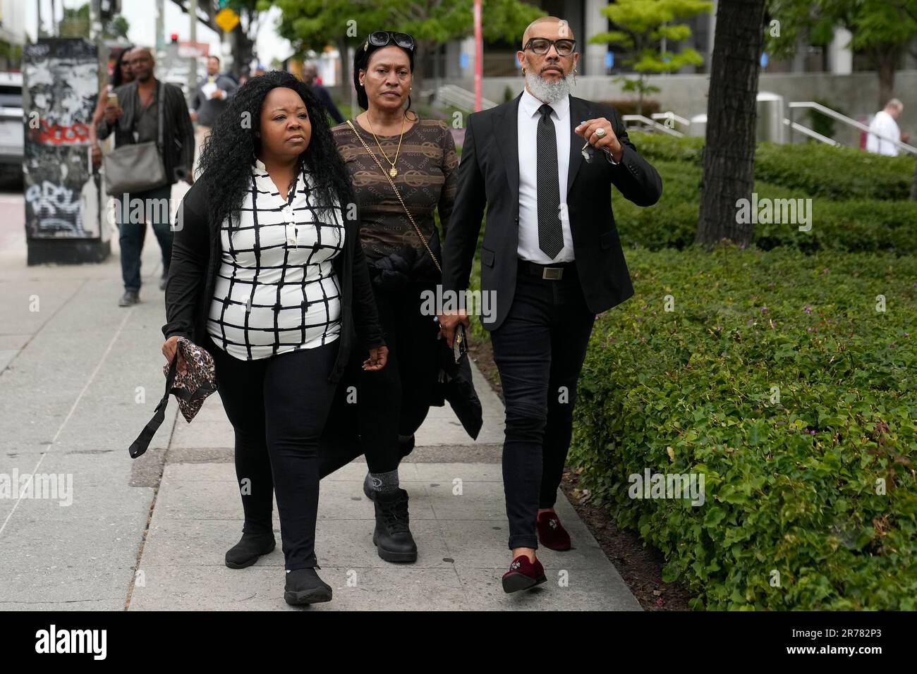 Sonstar Peterson, the father of rapper Tory Lanez, far right, leaves ...