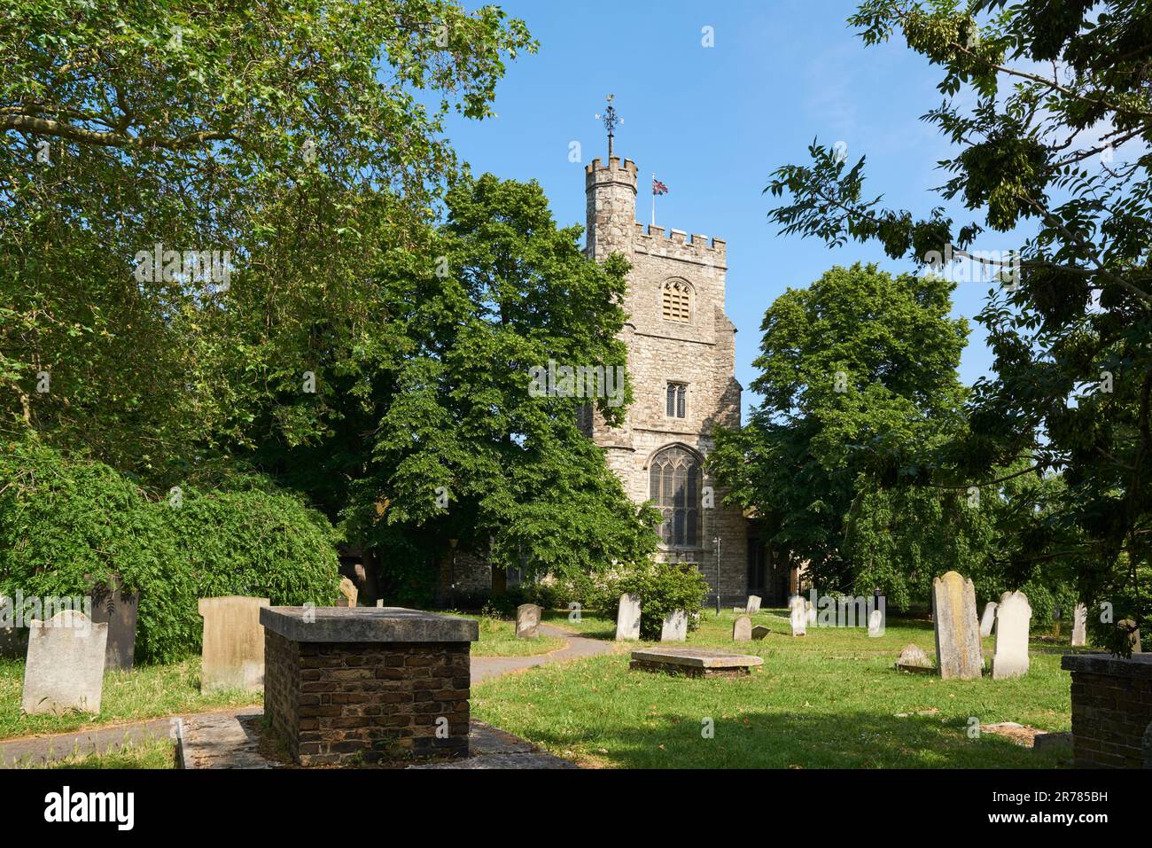 The churchyard and tower of the historic Grade I listed church of St ...