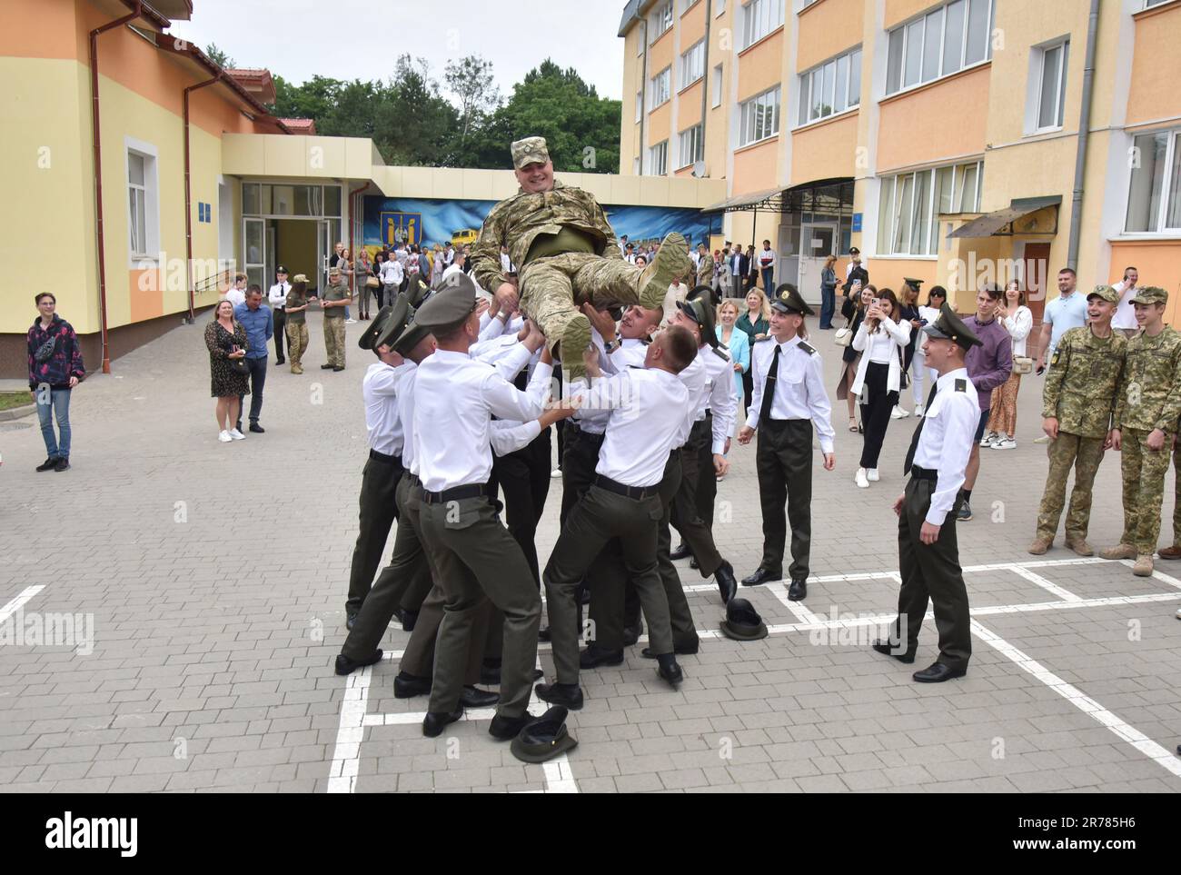 Cadets carry their teacher after the graduation ceremony at the Heroes ...