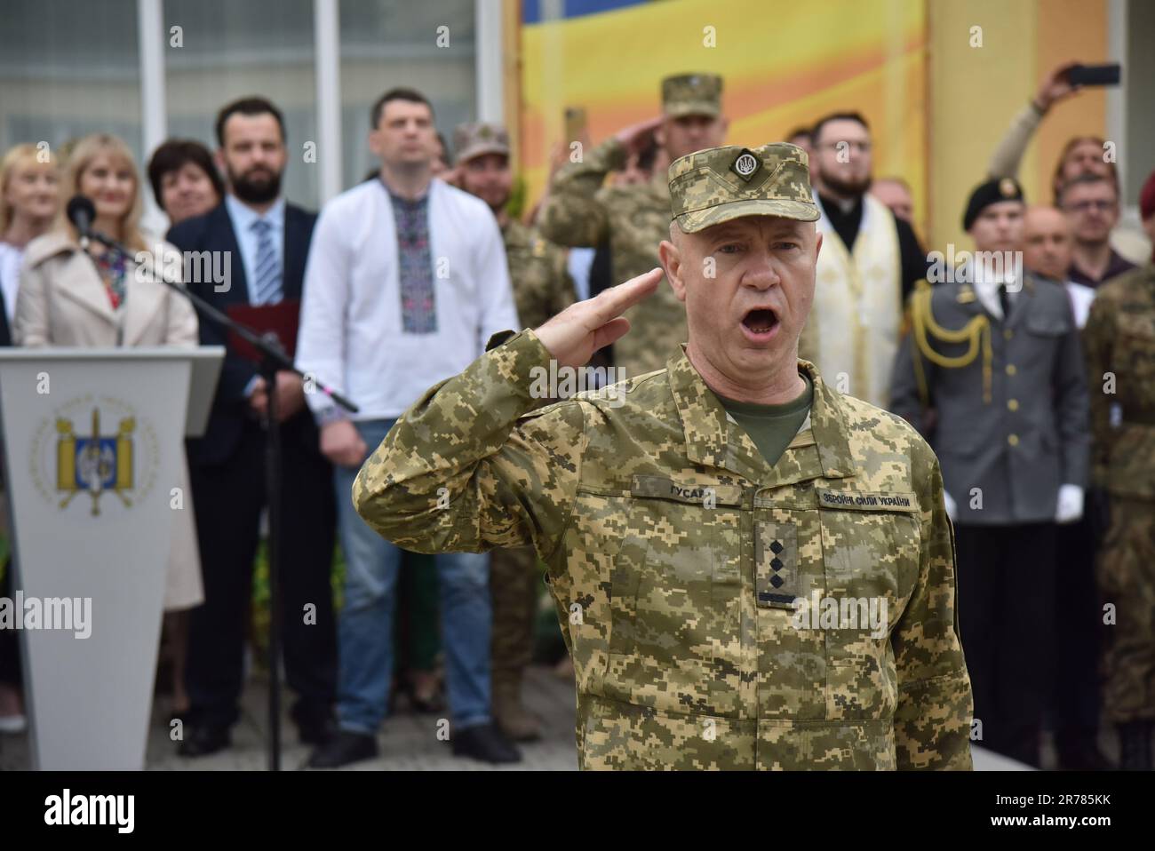 Cadets sing the national anthem of Ukraine during the graduation ...