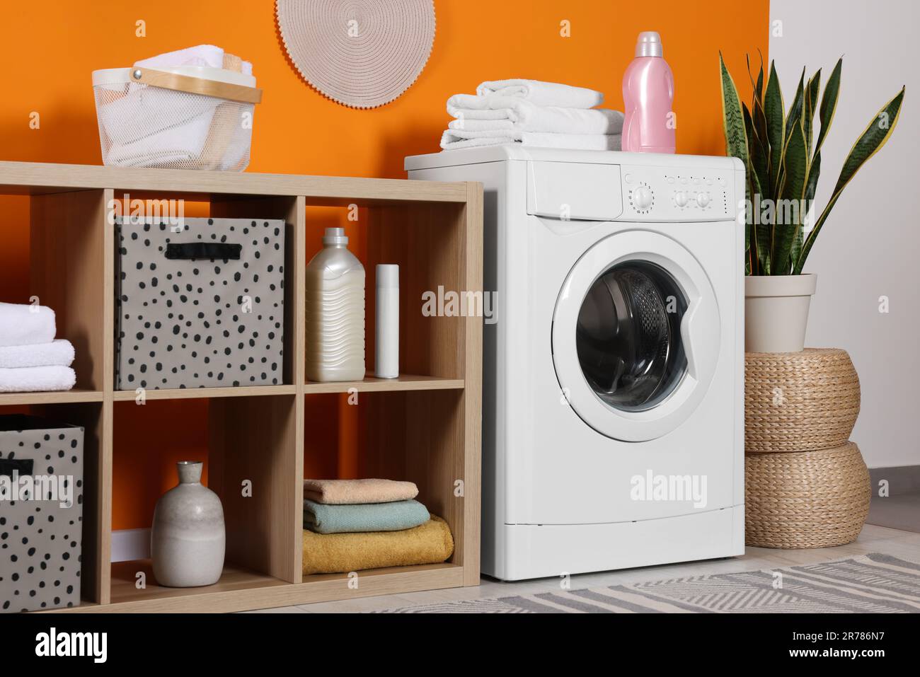 Stylish laundry room with washing machine. Interior design Stock Photo ...