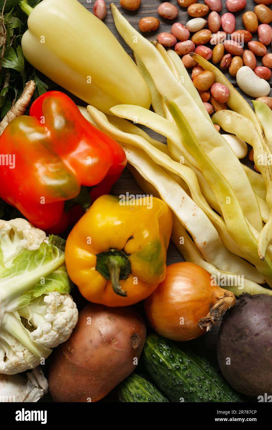 Different fresh vegetables as background, top view. Farmer harvesting ...