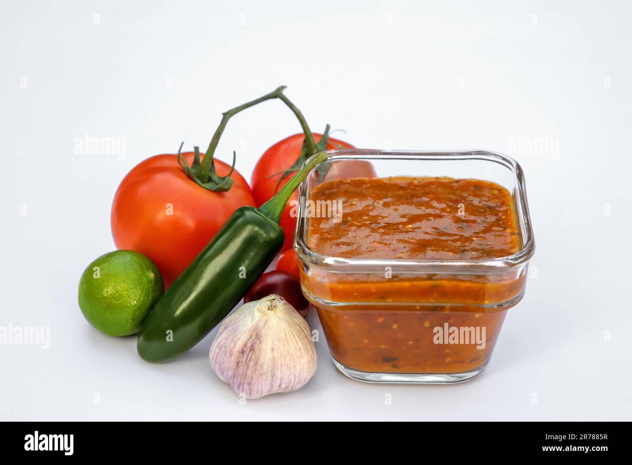 Delicious salsa sauce and ingredients on white background Stock Photo ...