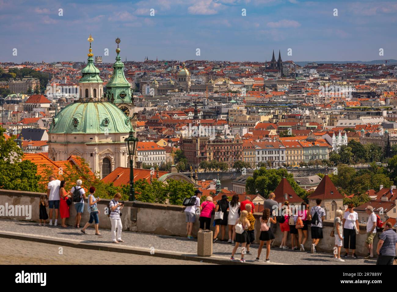 PRAGUE, CZECH REPUBLIC, EUROPE - Tourists walk in front of dome of St ...