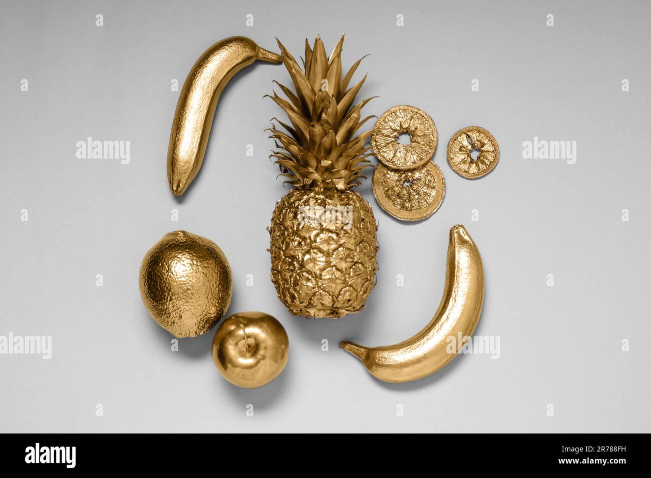 Different golden fruits on light grey background, flat lay Stock Photo ...