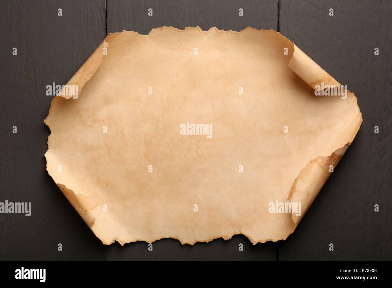 Sheet of old parchment paper on grey wooden table, top view Stock Photo ...